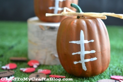 Painted Pumpkin Footballs - Fall Decor Idea