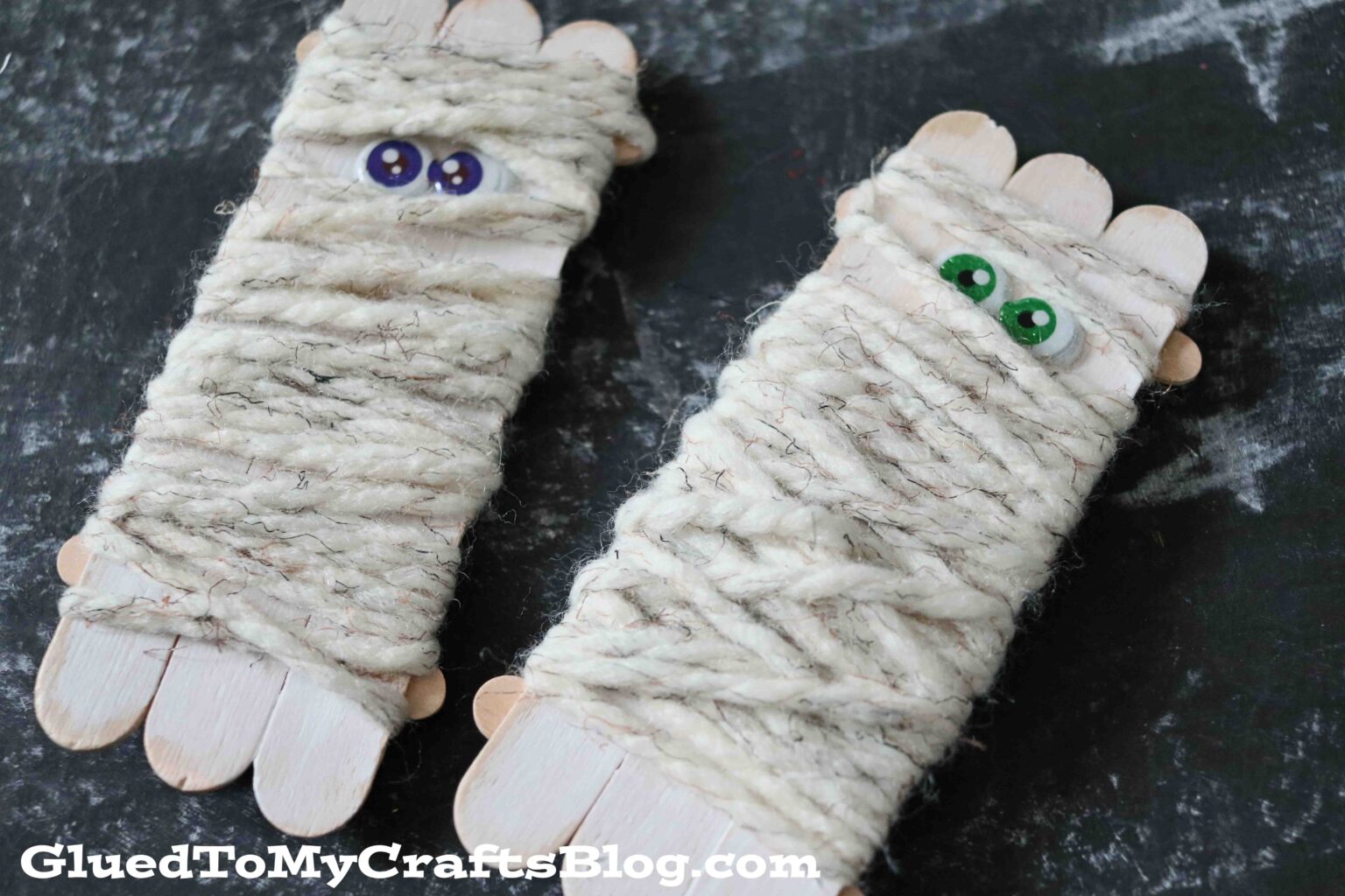Yarn & Popsicle Stick Mummy Craft Idea For Halloween