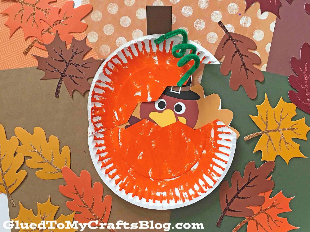 Turkey Hiding In A Paper Plate Pumpkin