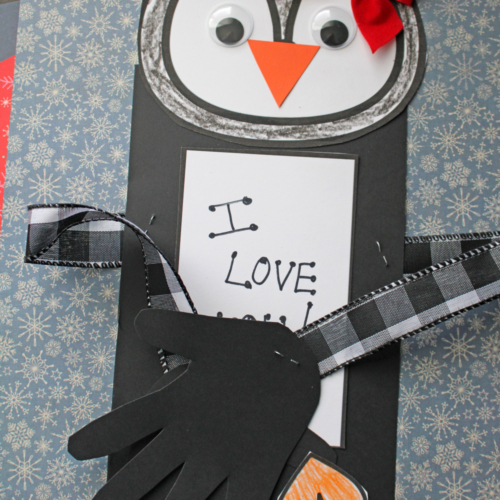 Handprint Penguin Hug Craft Idea