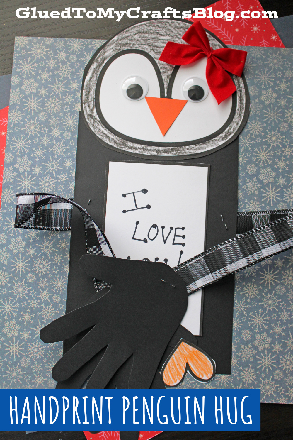 Handprint Penguin Hug Craft Idea