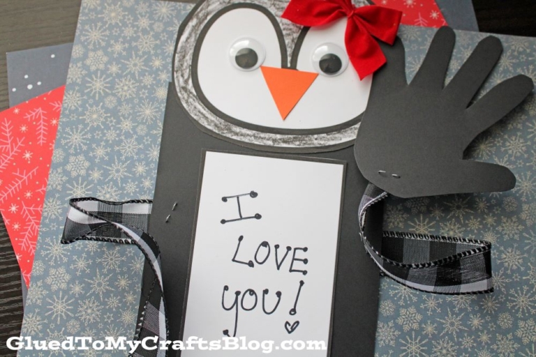 Handprint Penguin Hug Craft Idea